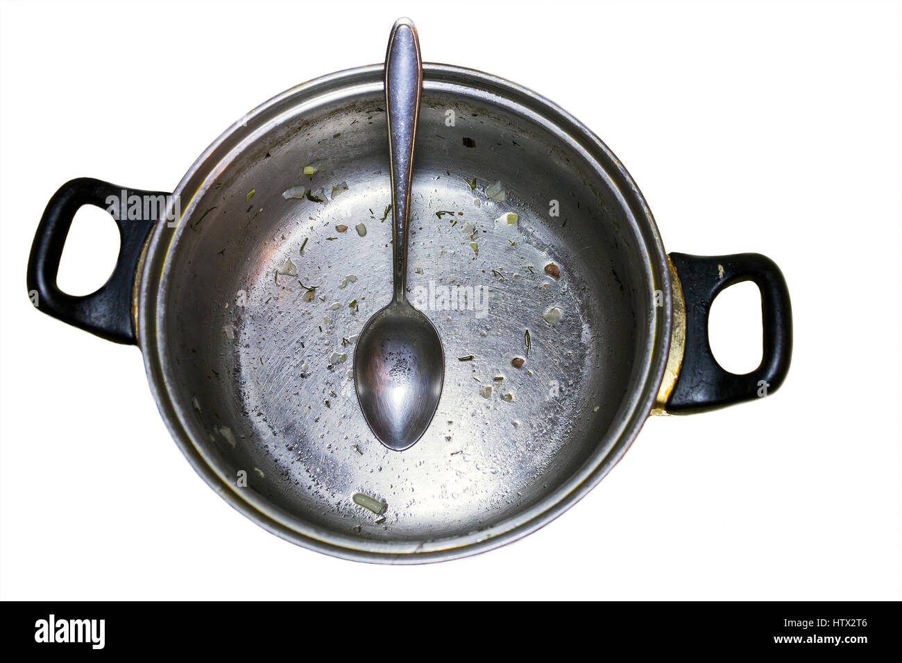 Unwashed pot with spoon isolated Stock Photo - Alamy