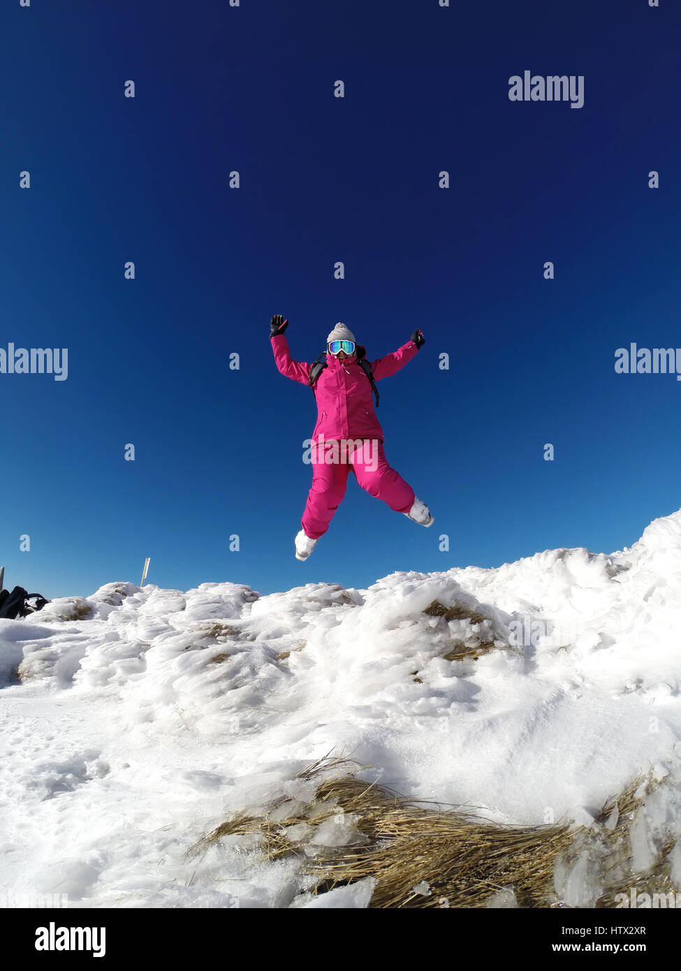 Female snowboarder on mountain in hi-res stock photography and images ...