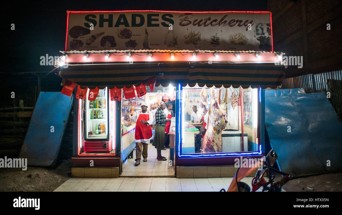 a popular butchery displays their meats in the window in Kawangware ...