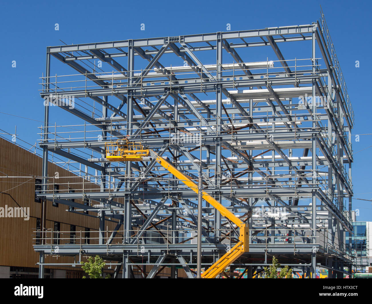 New commercial steel building under construction Stock Photo - Alamy