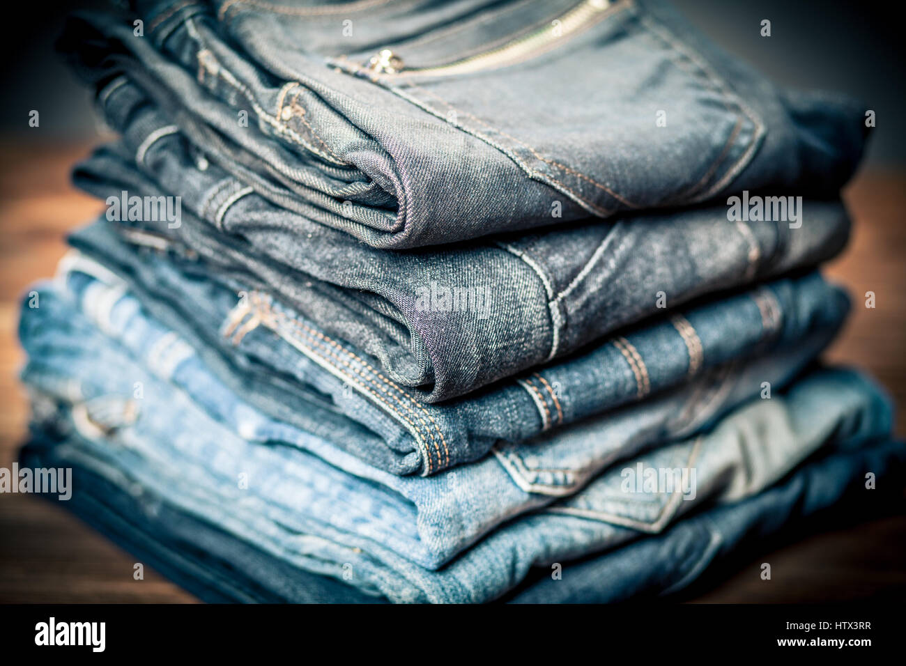 Pile of jeans Stock Photo - Alamy