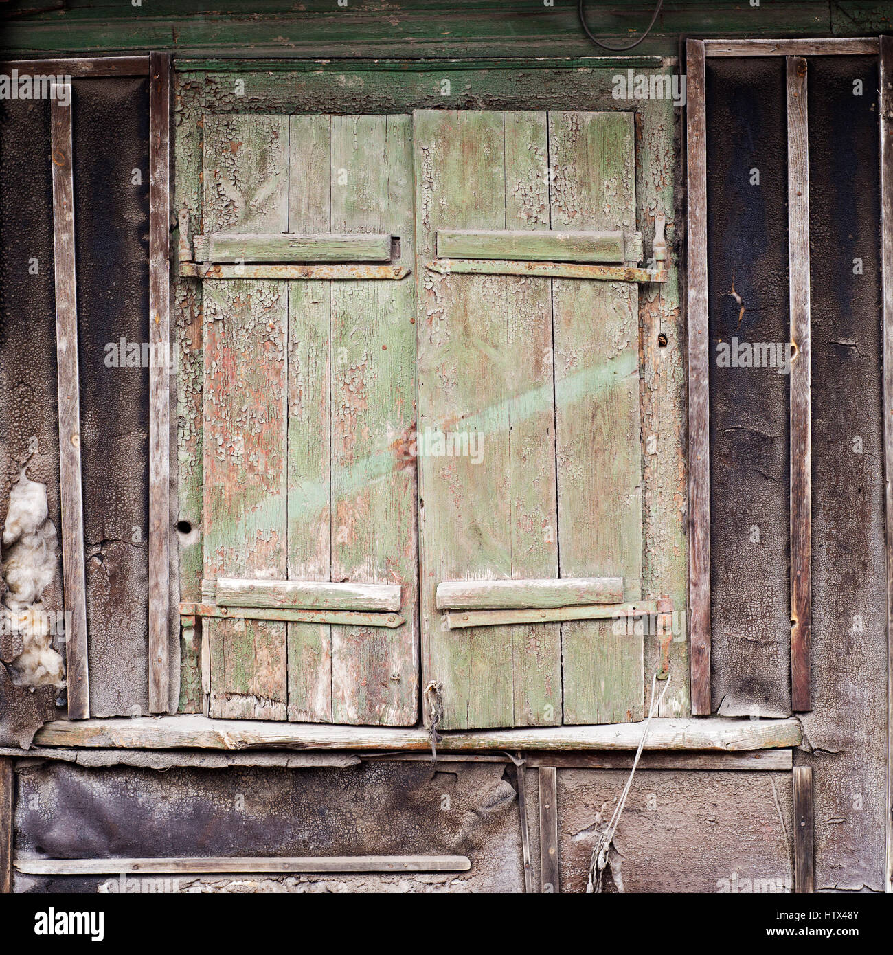 wall with boarded up window Stock Photo - Alamy