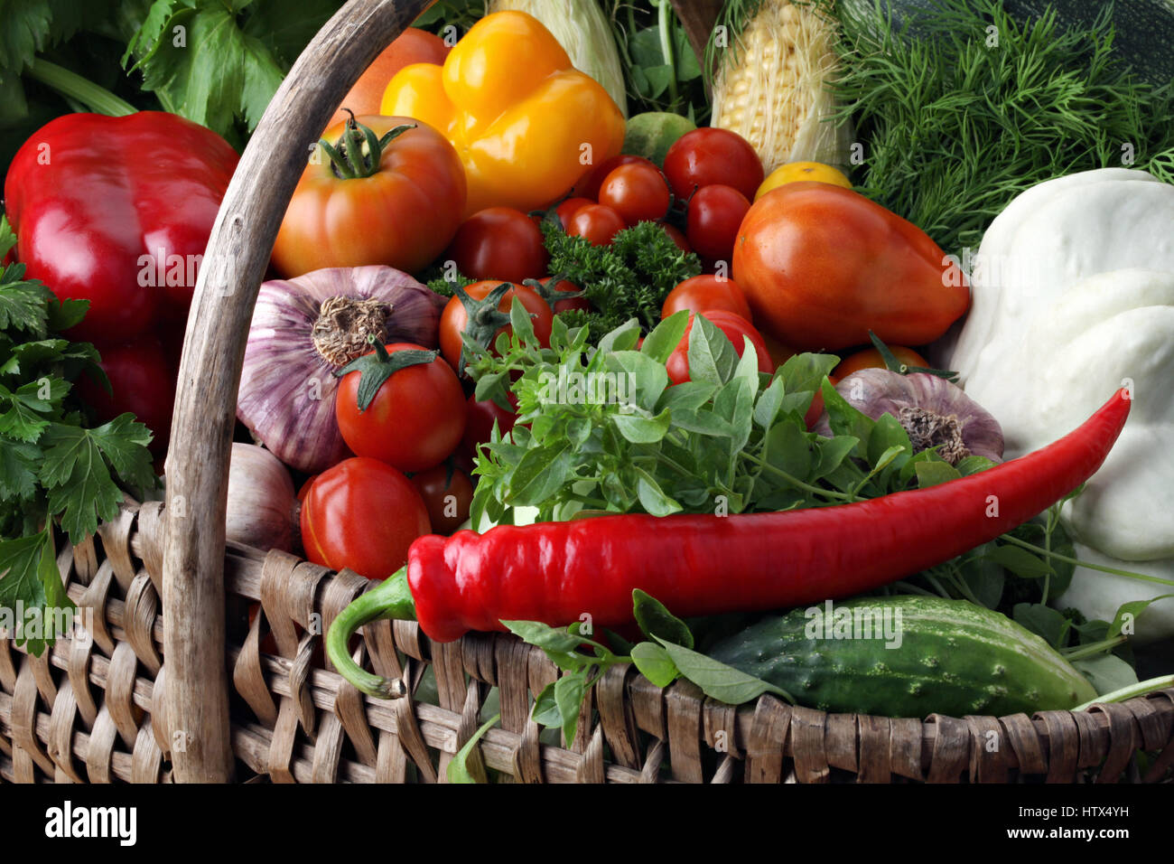 Basket with fresh farm vegetable Stock Photo - Alamy