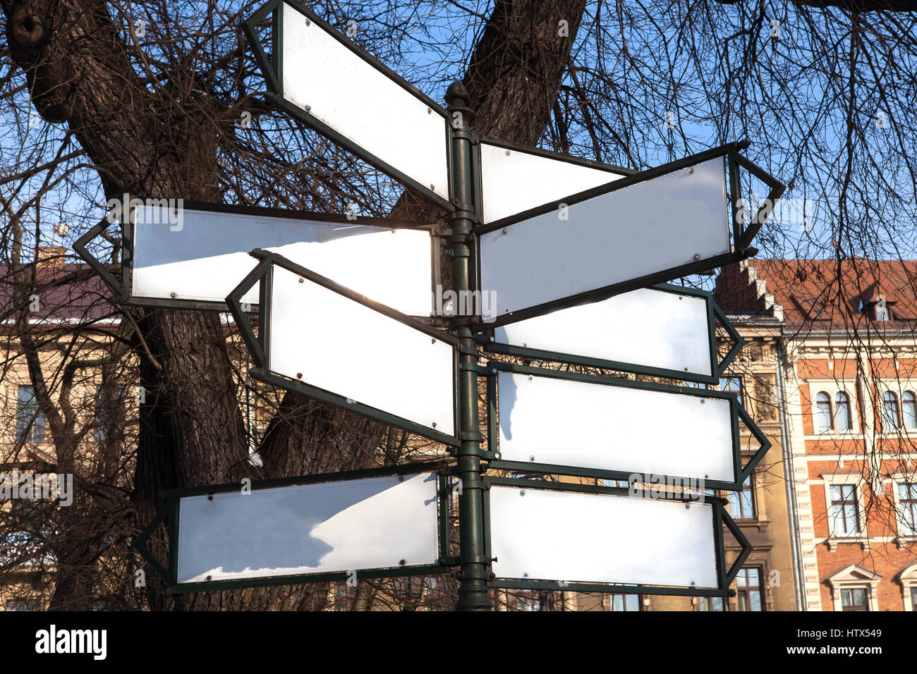 blank white mockup of retro style street advertising column stand on ...