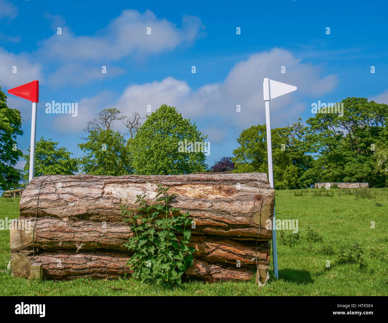 Log pile horse jump in field on sunny day, Smeaton, East Linton, East ...