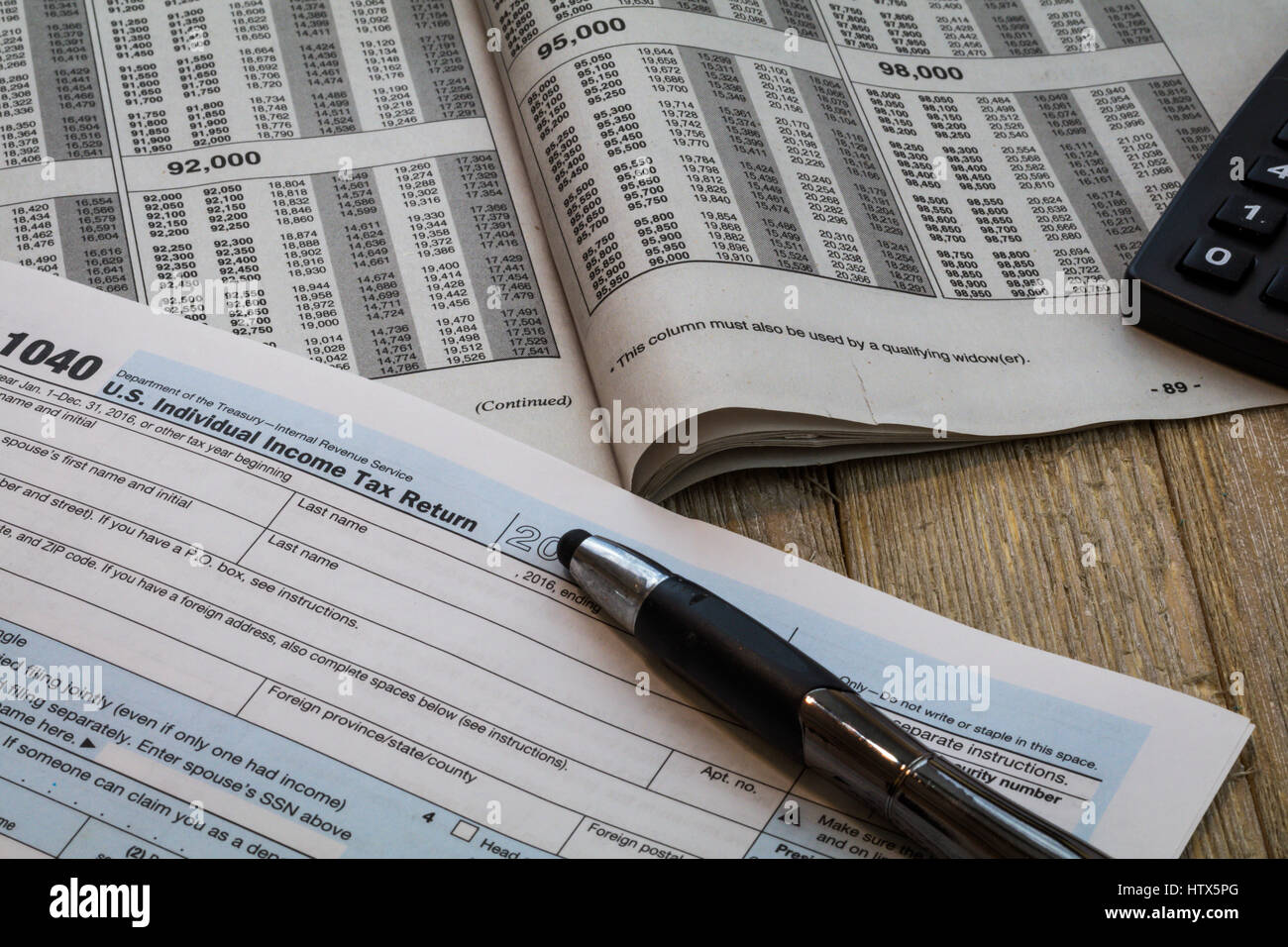 Tax preparation forms and tax booklet US 1040 Tax form Stock Photo - Alamy