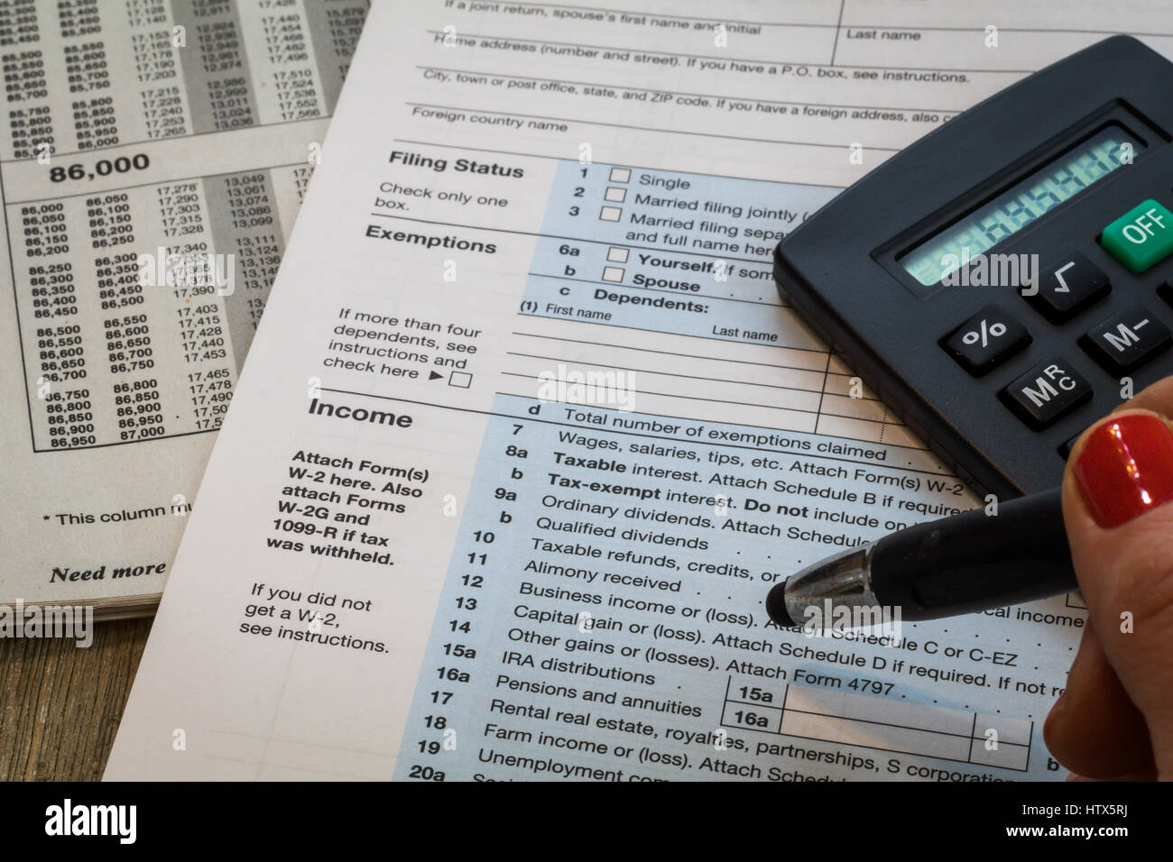 Tax preparation forms and tax booklet US 1040 Tax form Stock Photo - Alamy