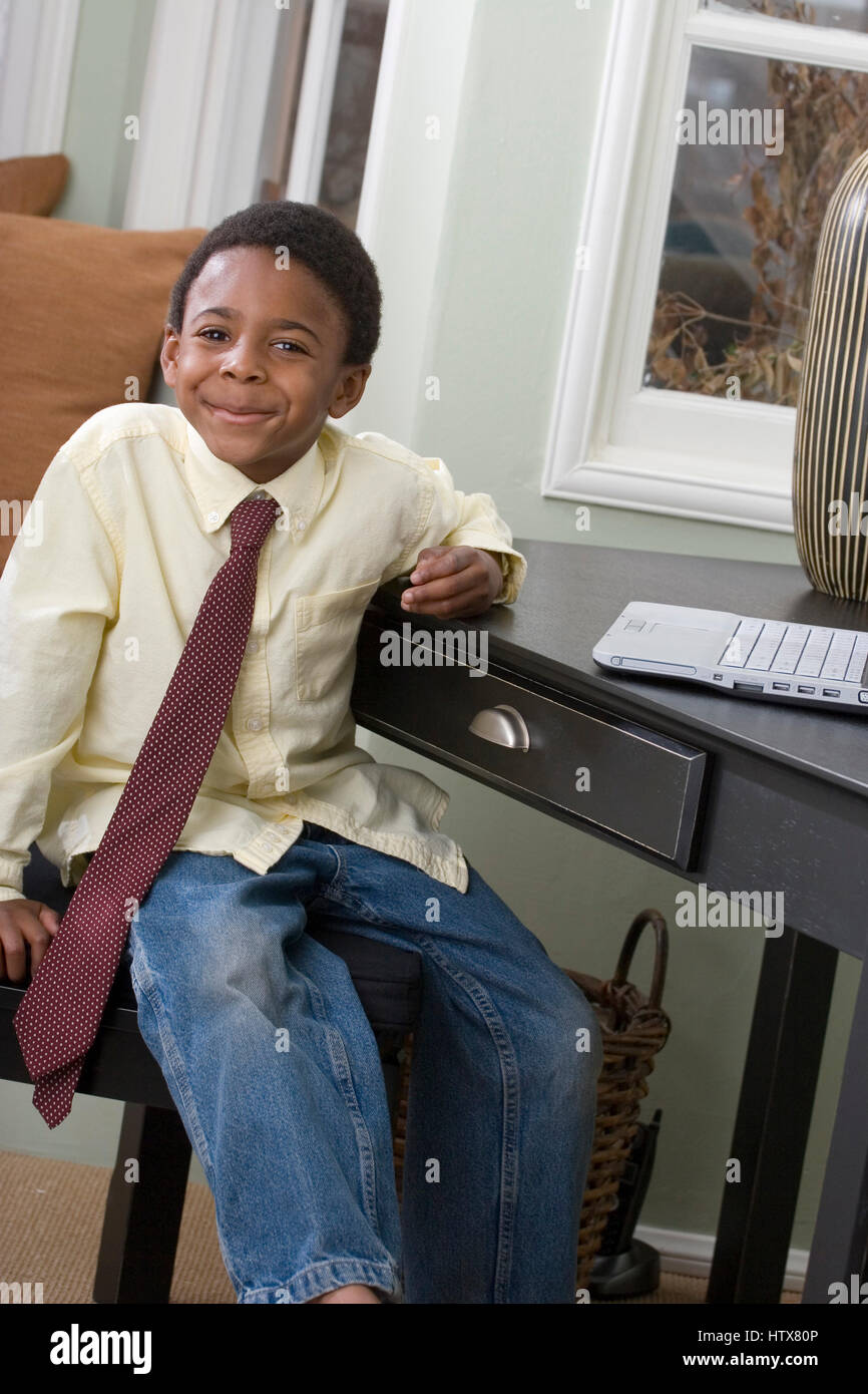 Little boy working on the computer at home Stock Photo - Alamy