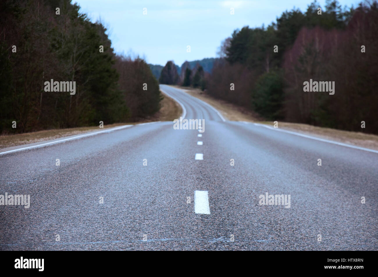 Long asphalted road Stock Photo - Alamy