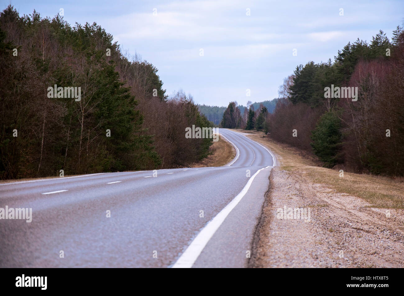 Long asphalted road Stock Photo - Alamy