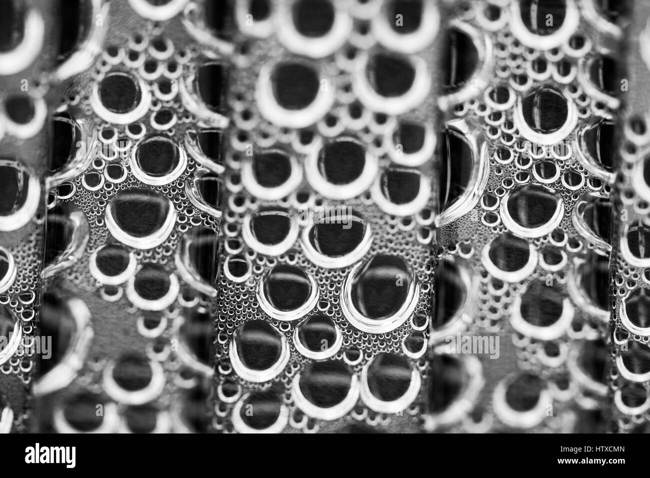 Water droplets, condensation, bubbles VERY close up. Abstract black and ...