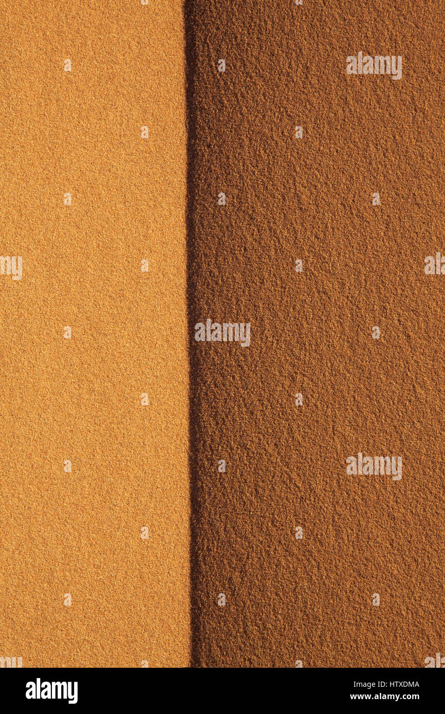 Background texture of desert sand.Top of real sand dune at sunset in ...