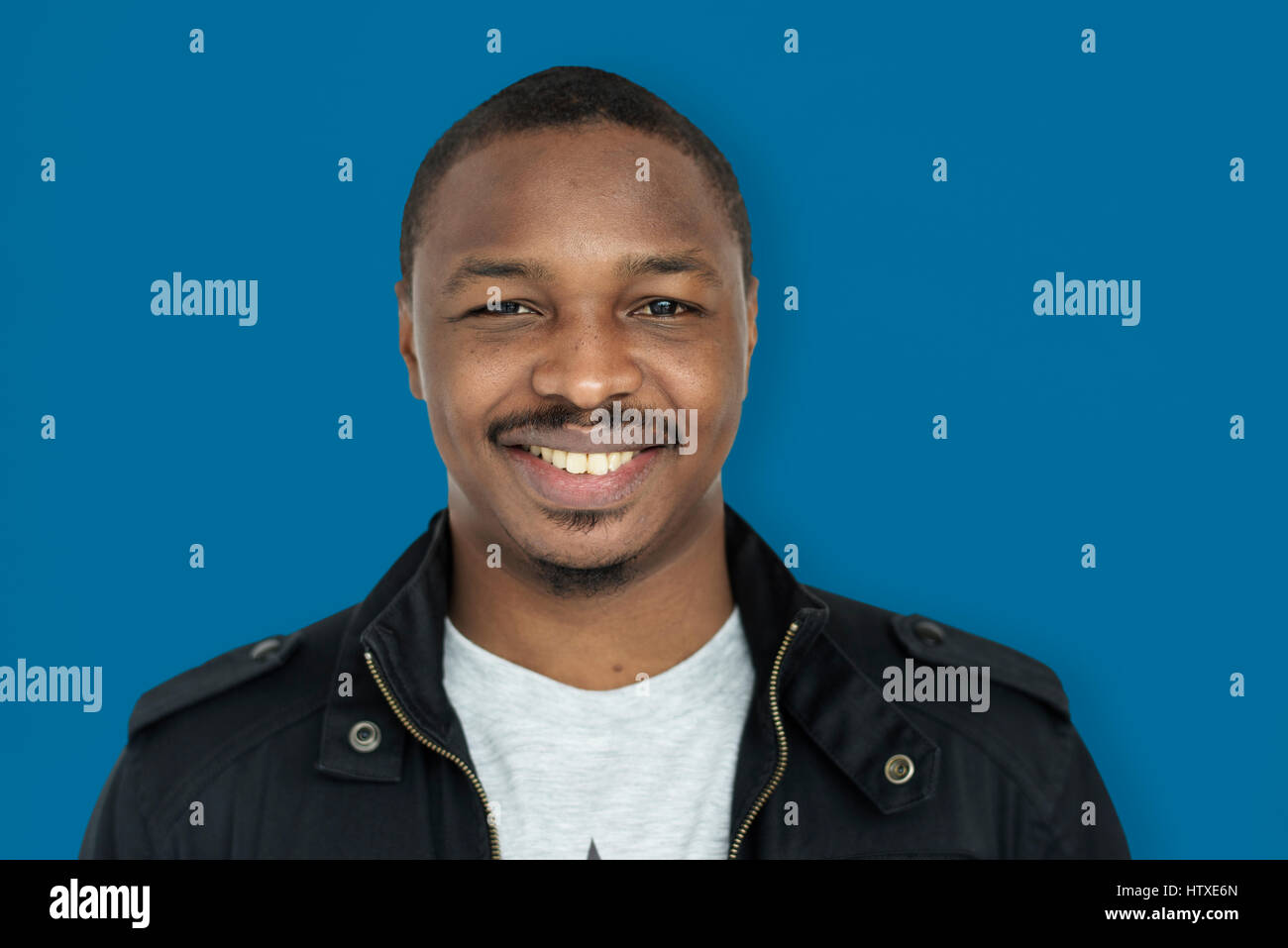 African Man Smiling Happiness Studio Portrait Stock Photo - Alamy