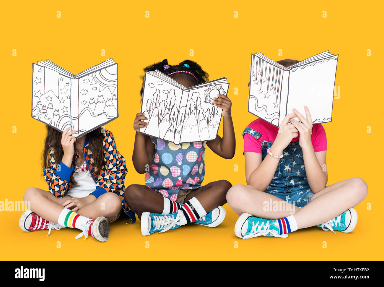 Little Children Reading Story Books Stock Photo - Alamy
