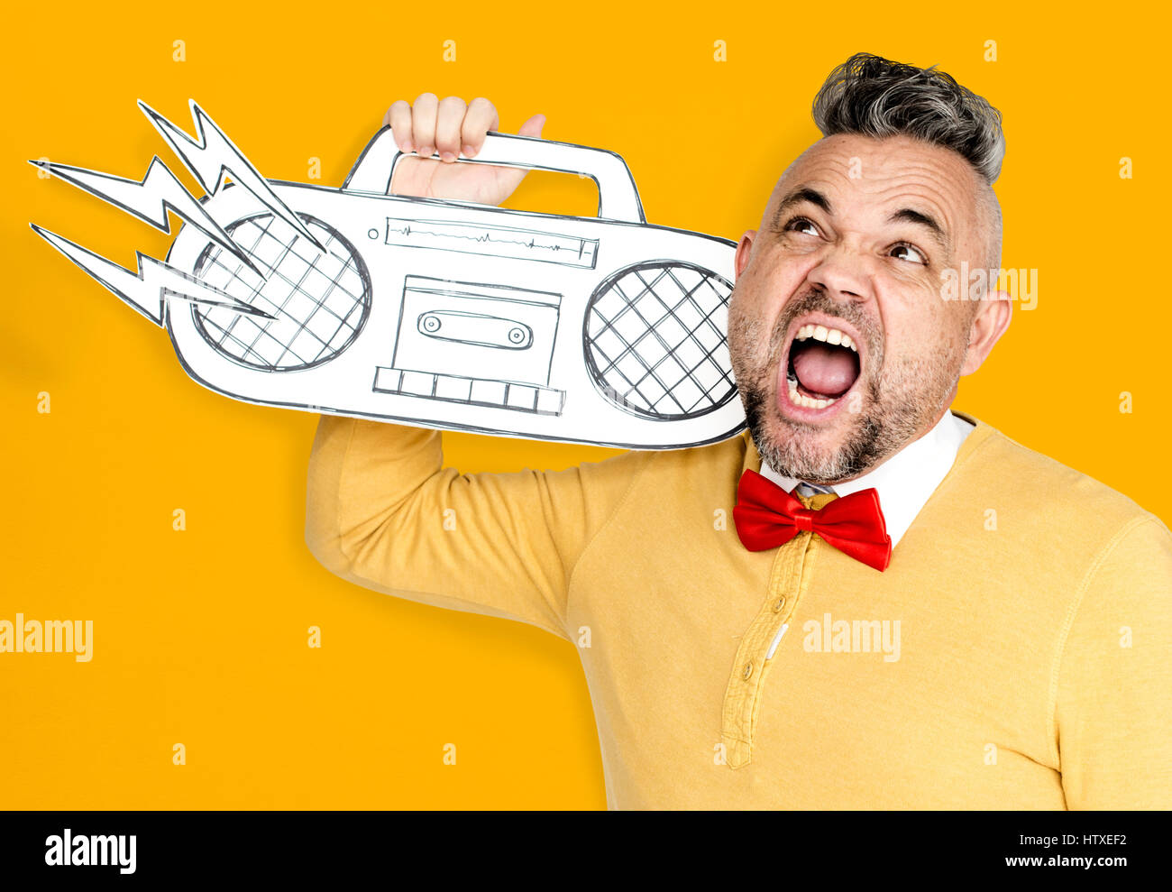 Caucasian Man Holding Paper Crafted Jukebox Stock Photo - Alamy