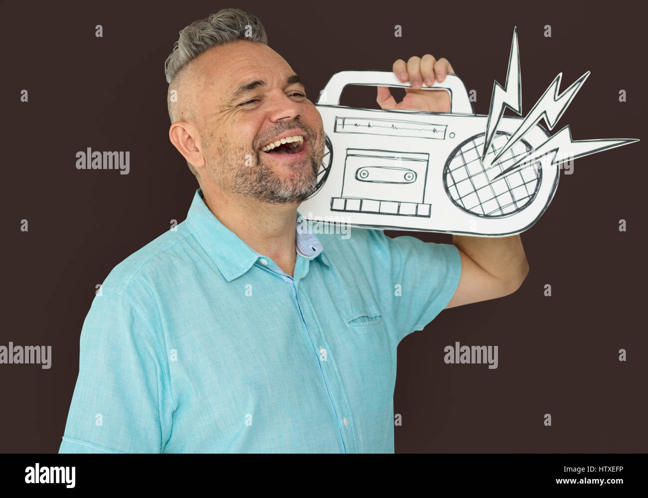 Caucasian Man Holding Paper Crafted Jukebox Stock Photo - Alamy