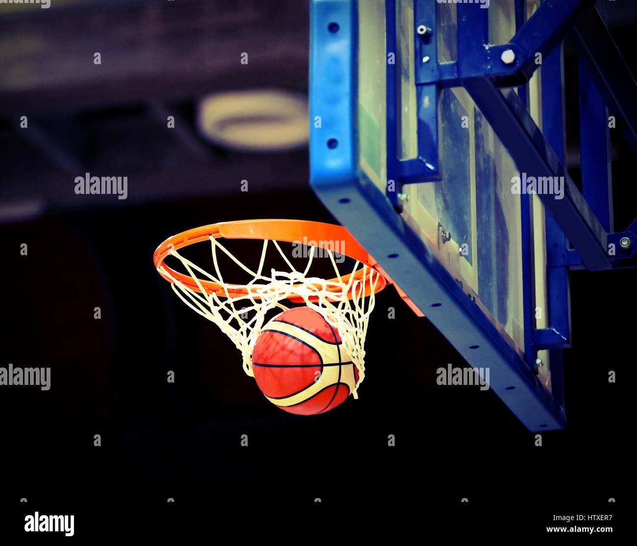 excellent shooting and basketball going into the basket Stock Photo - Alamy
