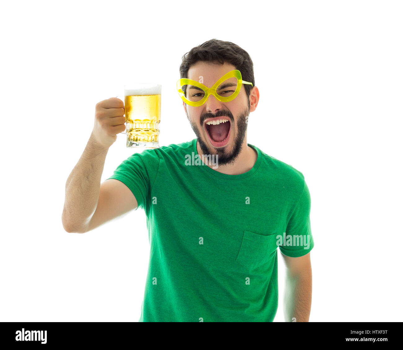Man with funny glasses is laughing and holding a bier mug. wearing ...