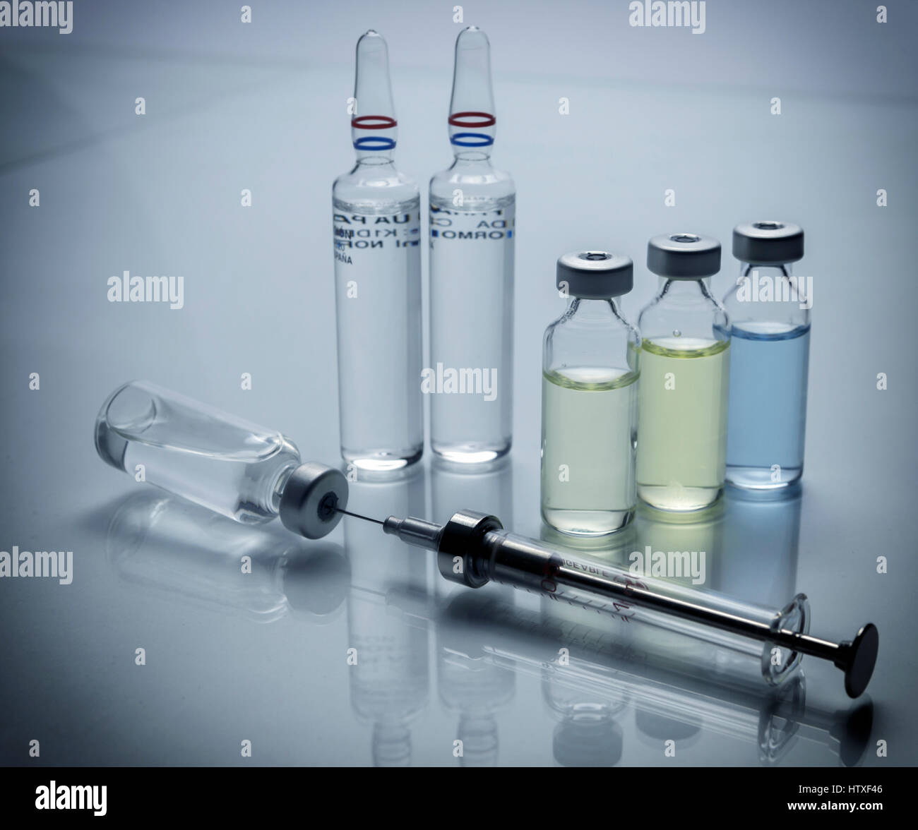 Medicine in vials and syringe ready for vaccine injection Stock Photo ...