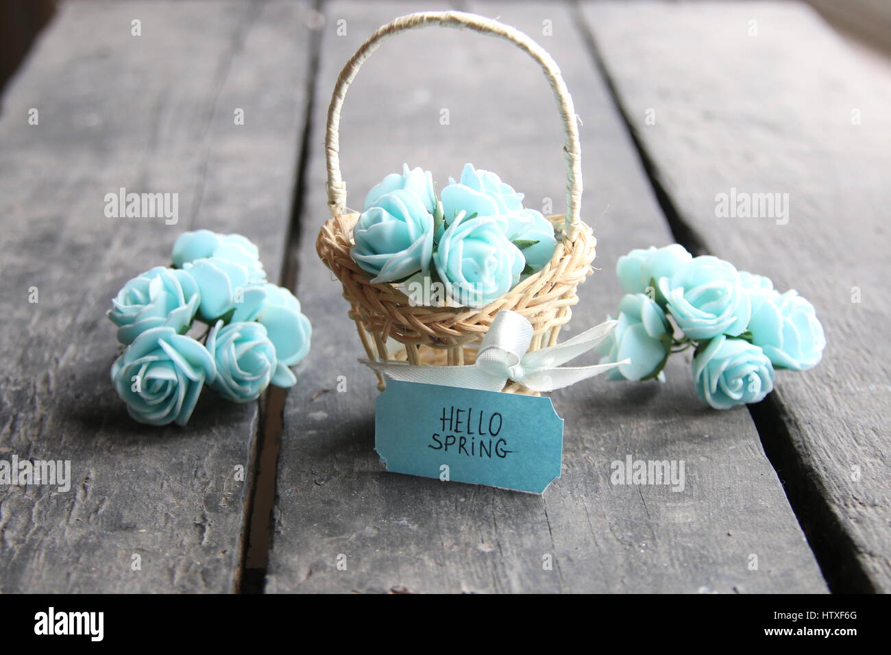 Hello spring tag and flowers in a small basket, Vintage Retro Or Rustic ...