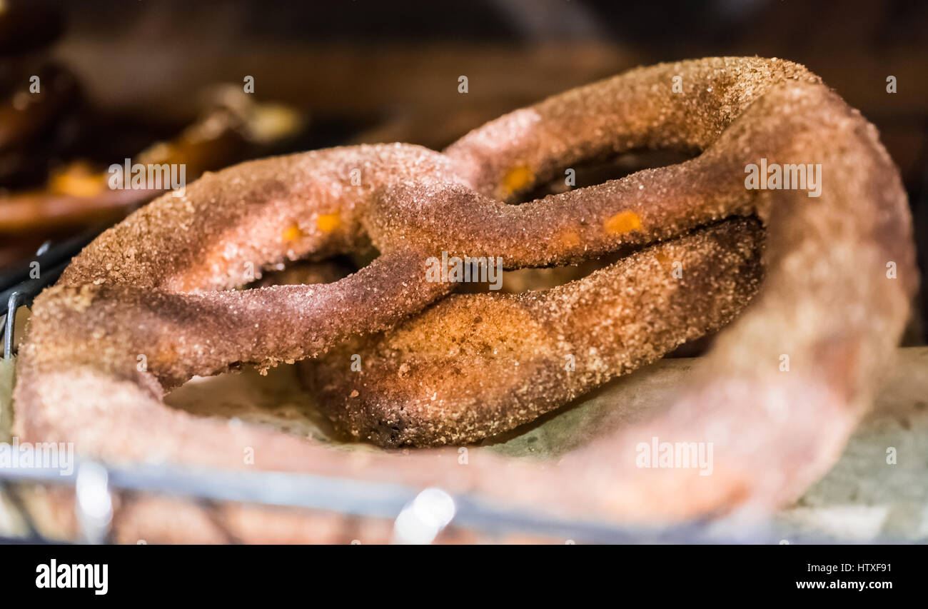 Large pretzel on display in bakery macro closeup Stock Photo - Alamy