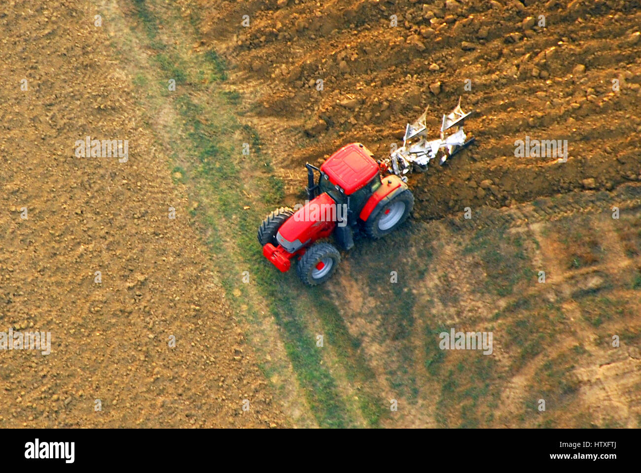 Aerial view of agriculture: cultivated fields, roads and urban traffic ...
