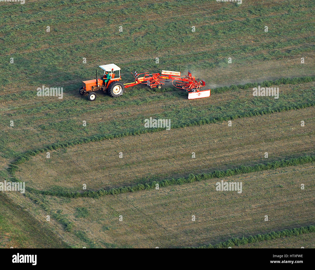 Aerial view of agriculture: cultivated fields, roads and urban traffic ...