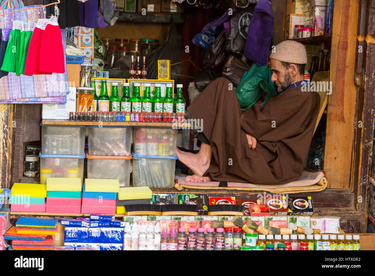 Fes, Morocco. Shopkeeper Dozing, Tala'a Kabira Street, in the Medina ...
