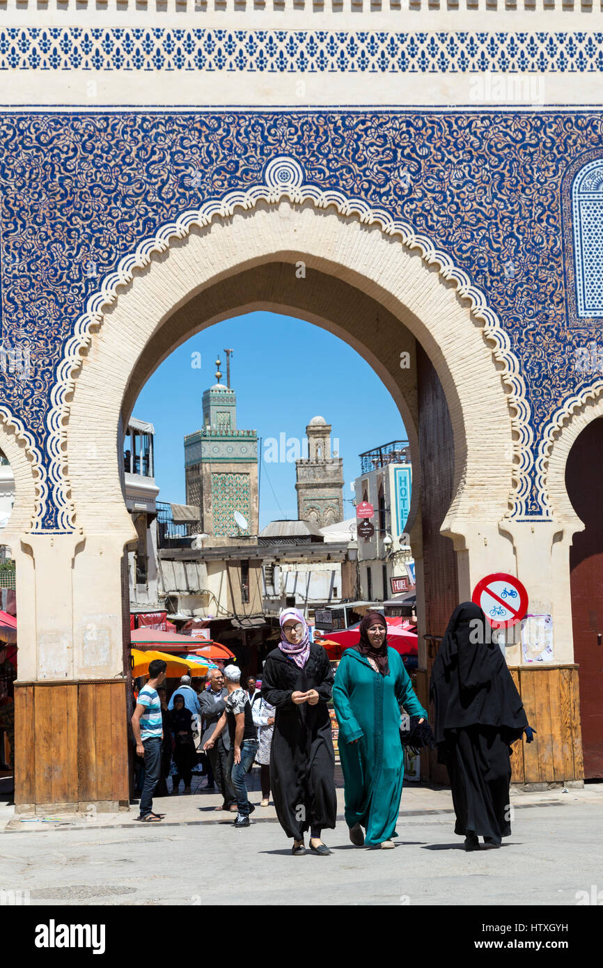 Fes, Morocco. One Fully-veiled Woman, Two in Djellabas, Leaving Fes El ...