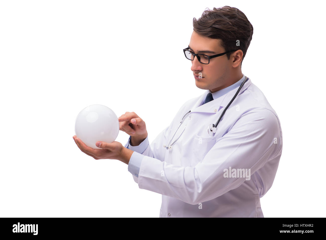 Doctor with crystal ball isolated on white background Stock Photo - Alamy