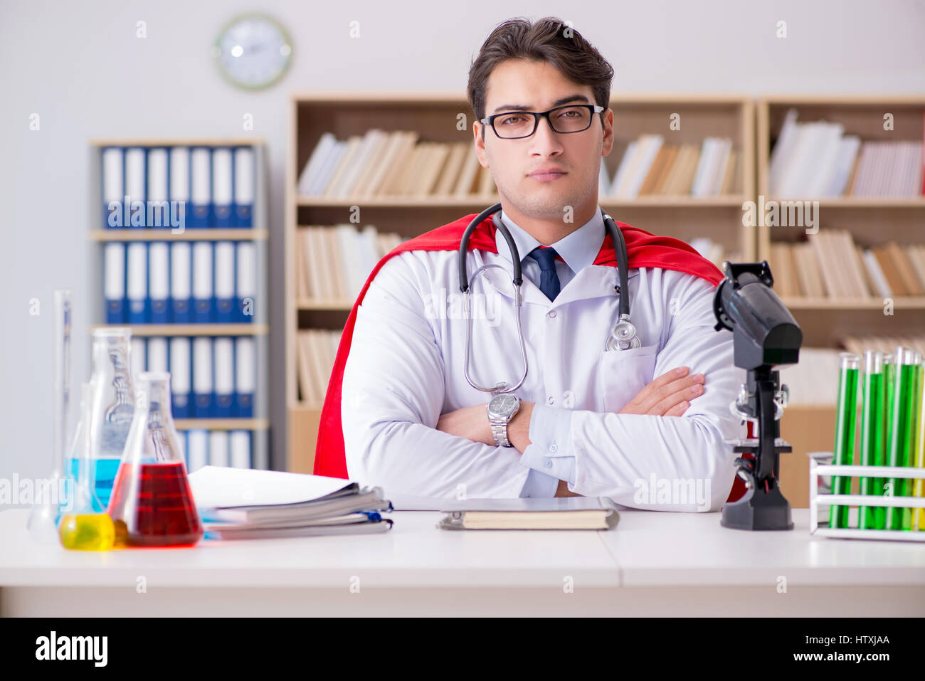 Superhero doctor working in the lab hospital Stock Photo - Alamy