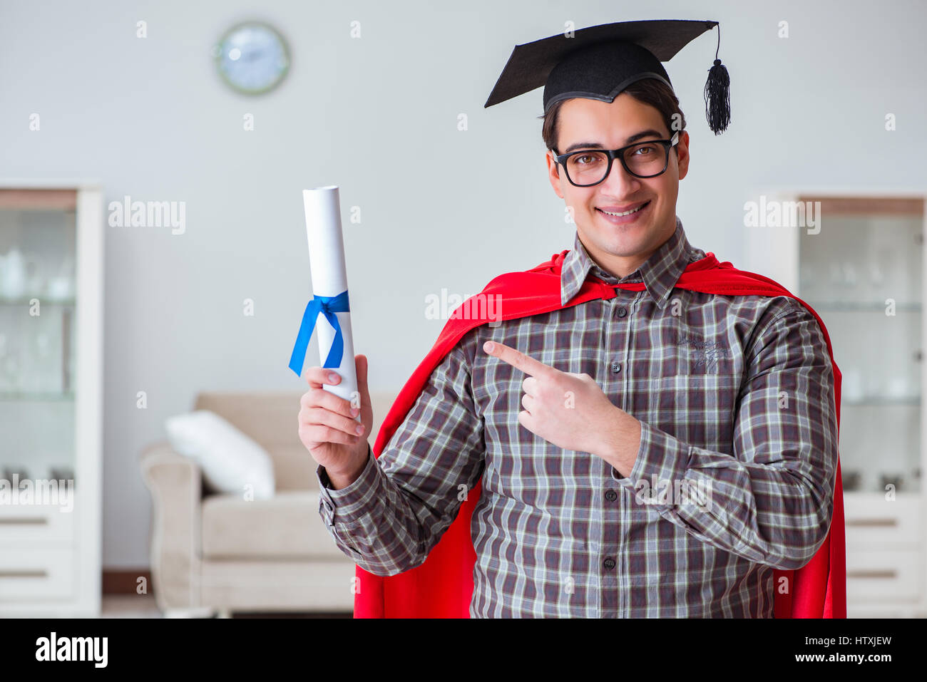Super hero student with books studying for exams Stock Photo - Alamy