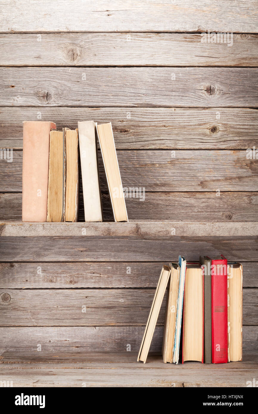 Old books on a wooden shelf. With empty space Stock Photo - Alamy