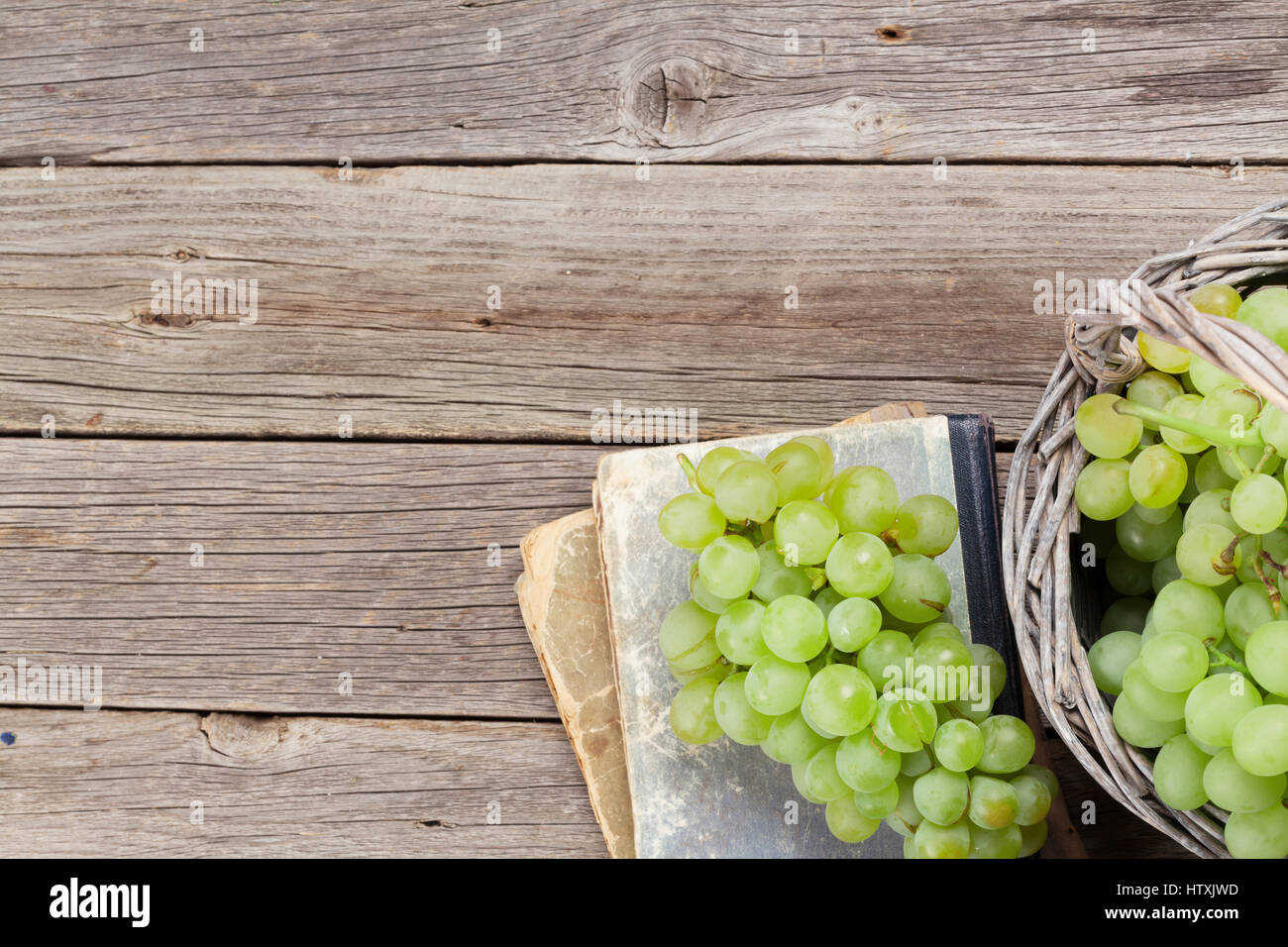 White grapes on wooden table. Top view with copy space for your text ...