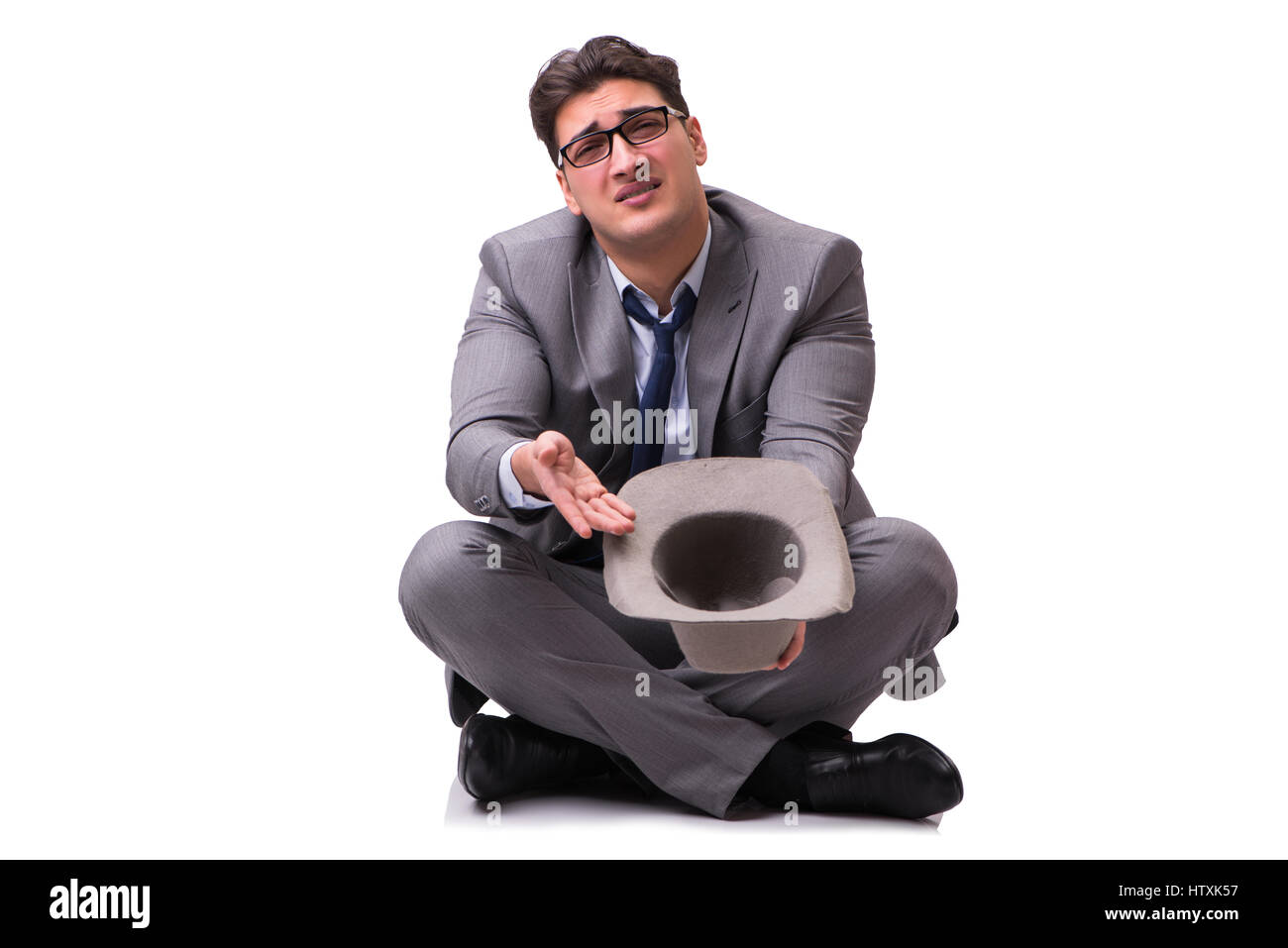 Bankrupt businessman isolated on white background Stock Photo - Alamy