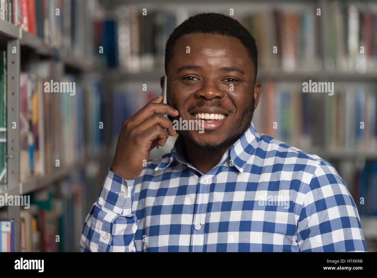 Young african beautiful student talking hi-res stock photography and ...
