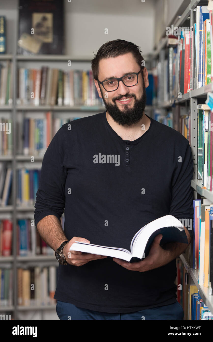 Portrait Of An Caucasian College Student Man In Library - Shallow Depth ...