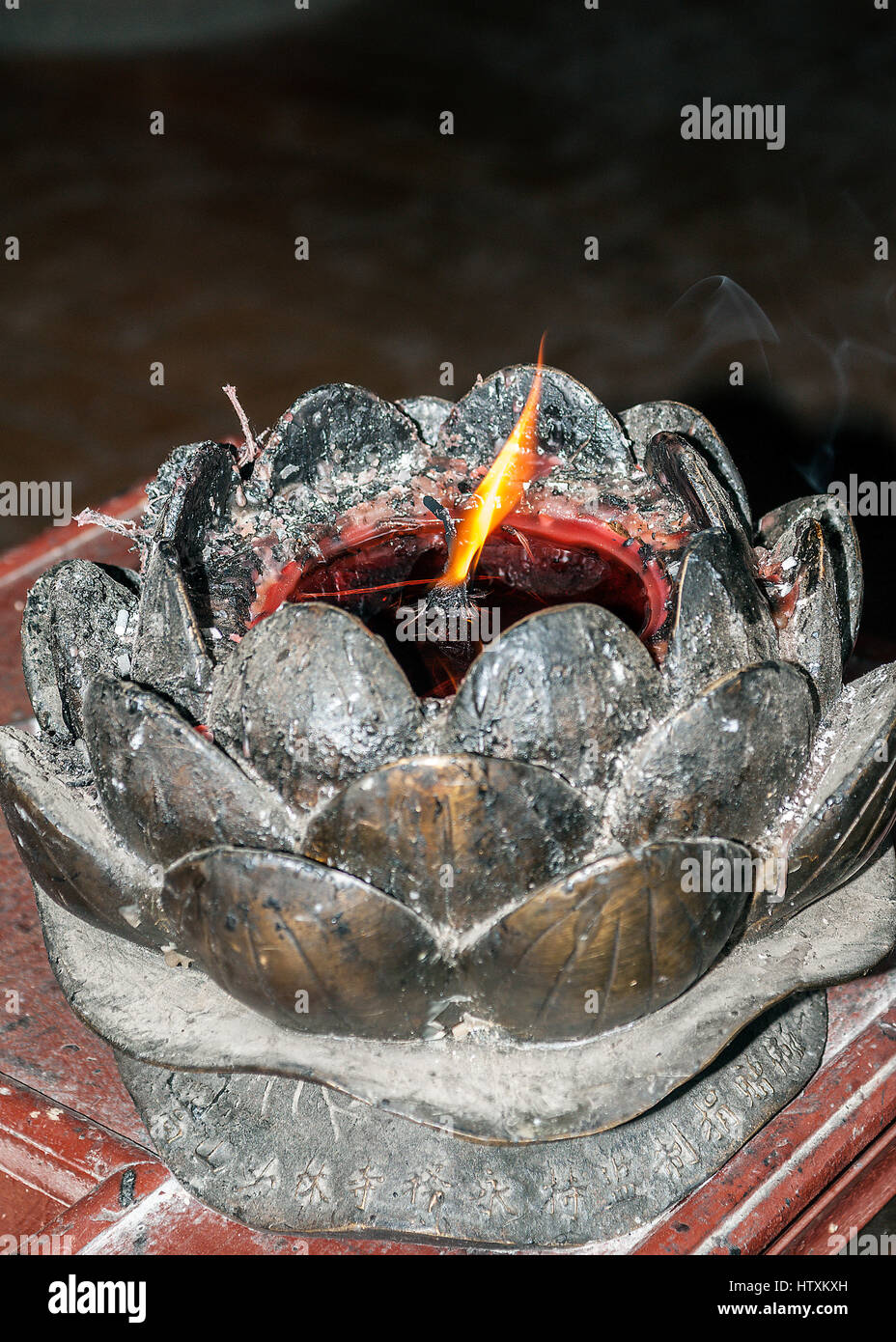 China, the Shaolin Monastery. Inextinguishable fire in the bronze lotus ...