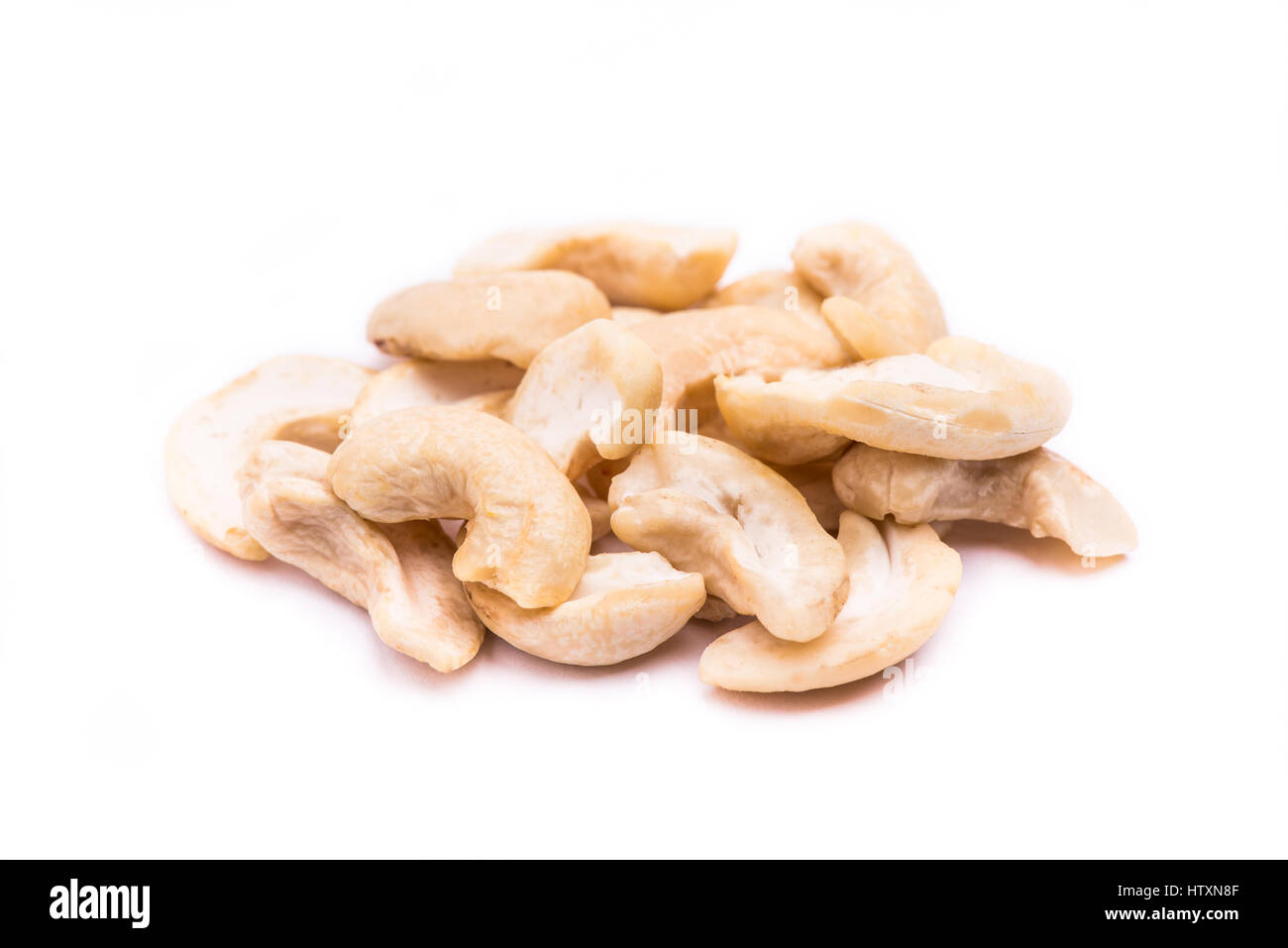 dried cashews isolated on white background Stock Photo - Alamy