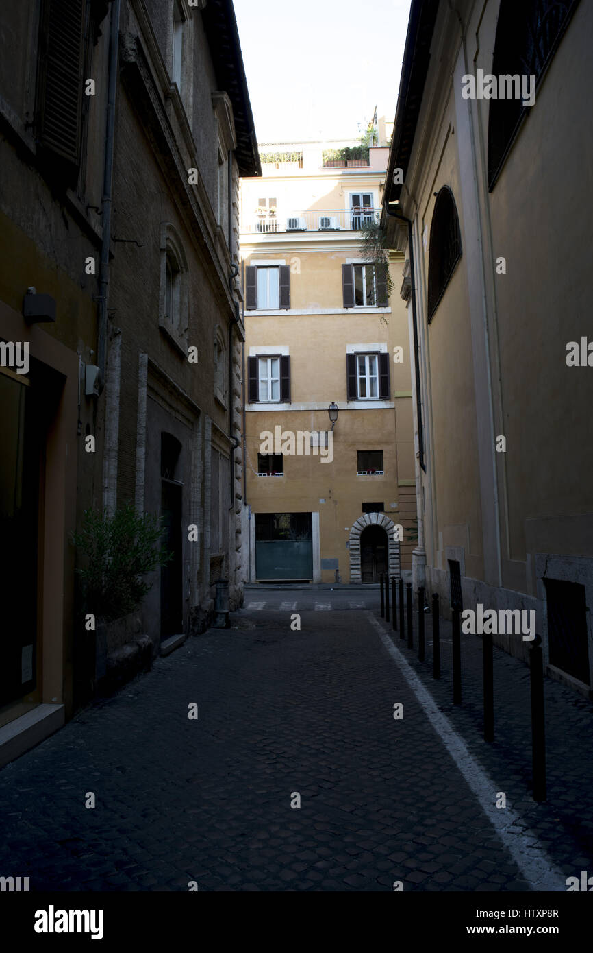 alley in shadow in historic centre of Rome Stock Photo - Alamy