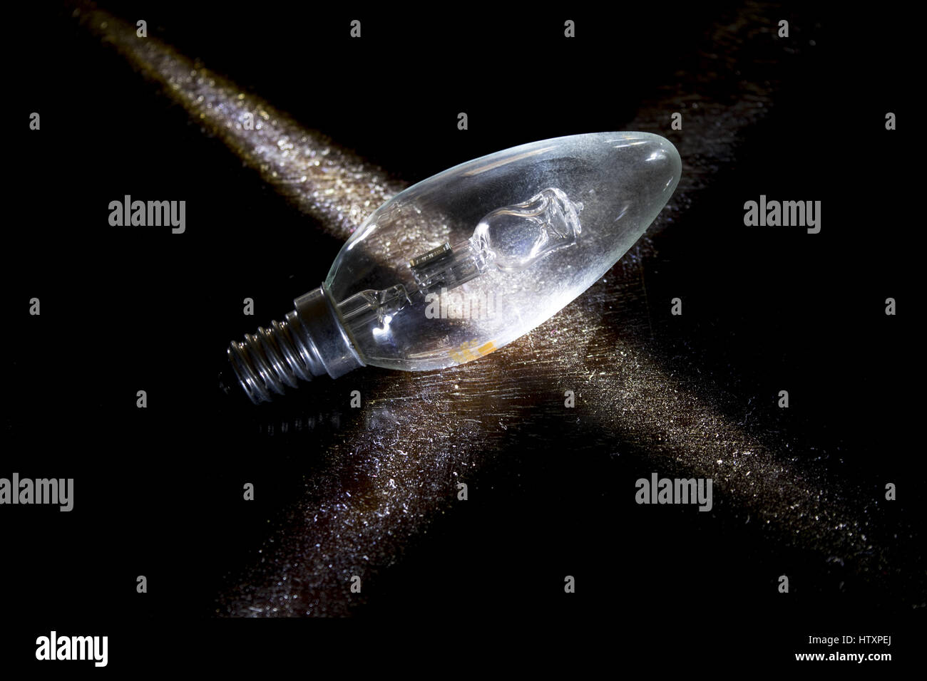 concept of ideas with a light bulb illuminated with stripes of light ...