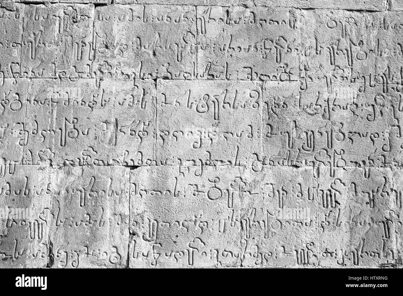 Old georgian writing carved into stone. Georgia, Caucasus. Unknown ...