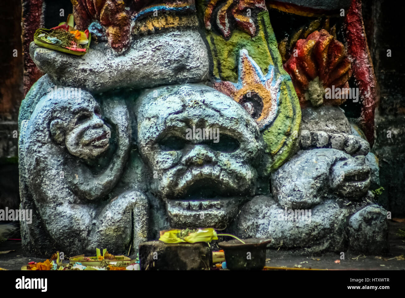 Scary sculpture in one of the temples in northern park of Bali ...