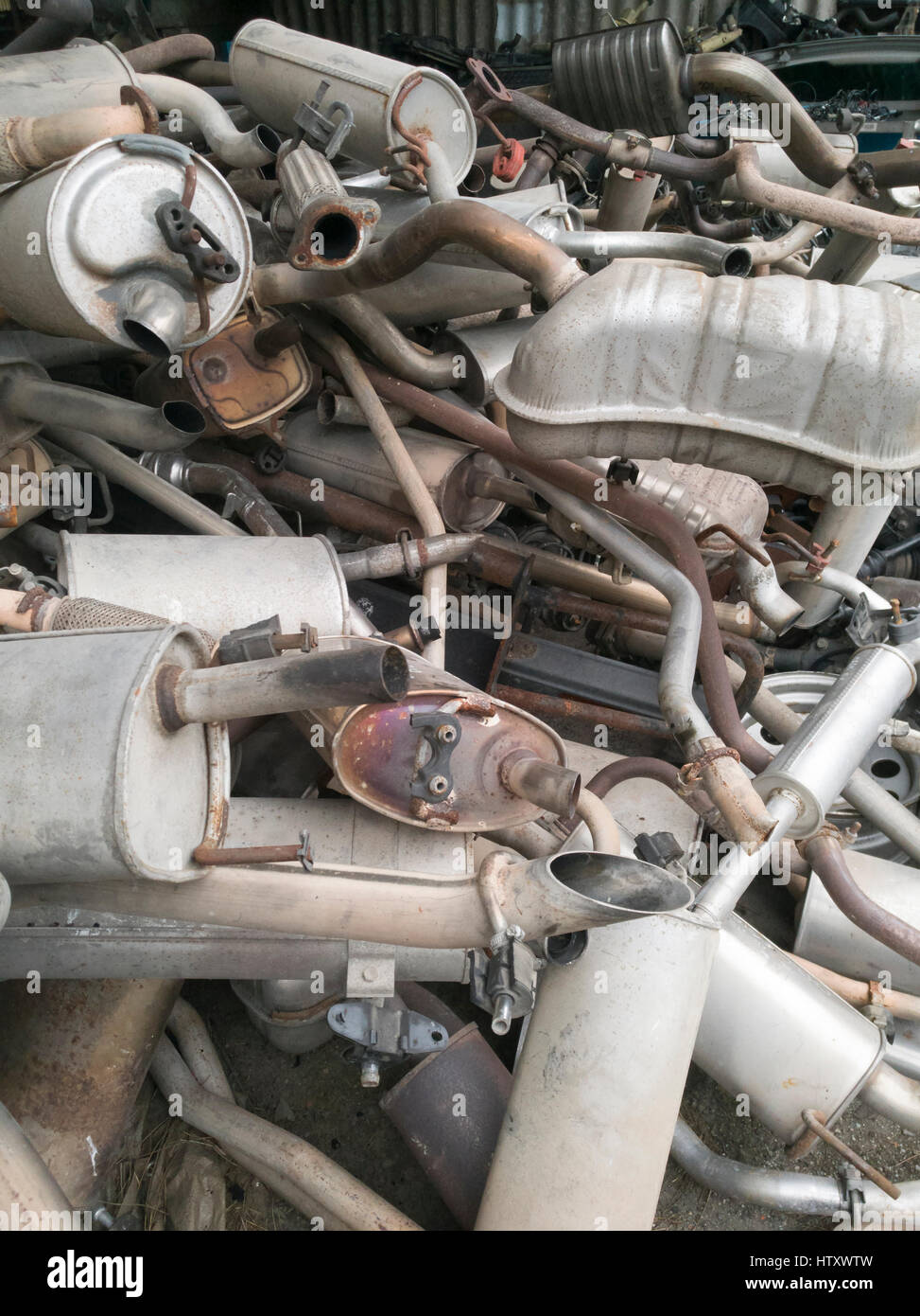spare parts for cars, recovery and recycling of mufflers for cars Stock ...