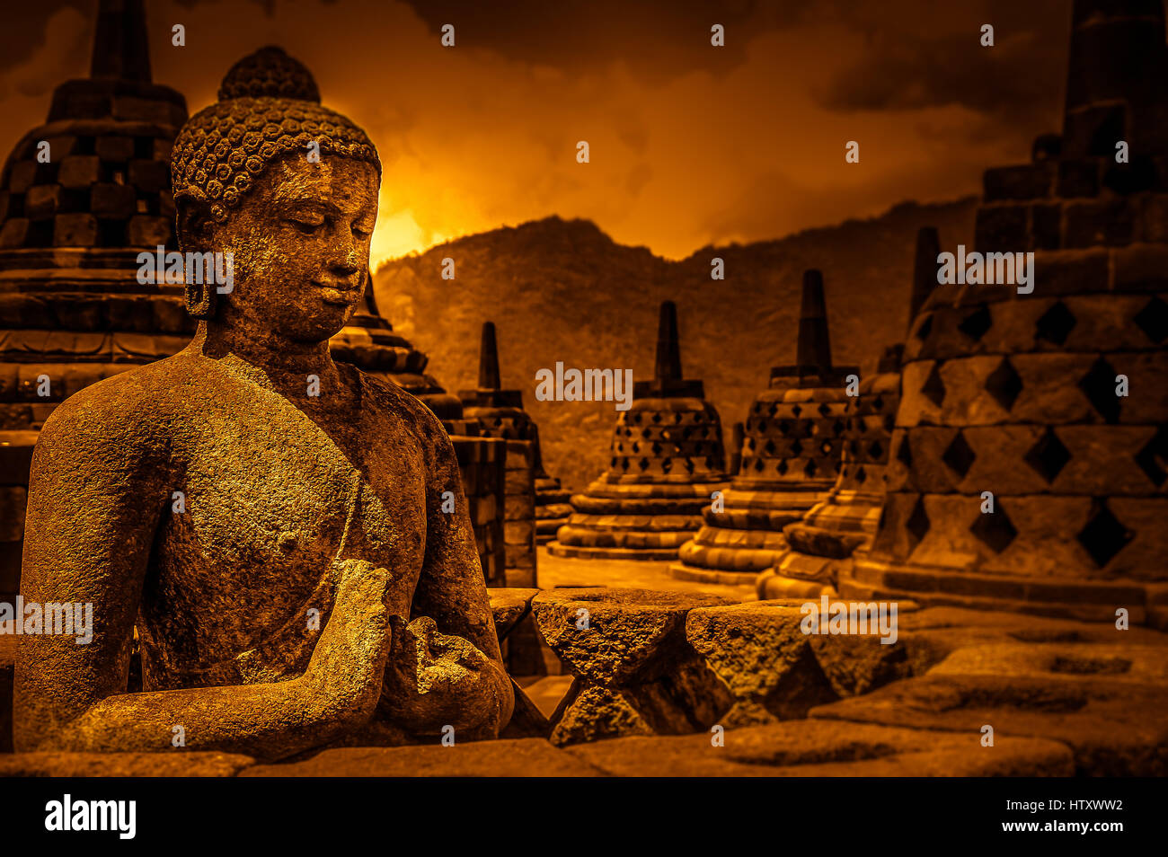 Buddha statue in Borobudur temple in Jawa in Indonesia Stock Photo - Alamy