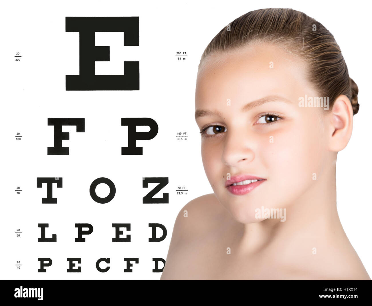 young girl with test vision table over background. concept of ...