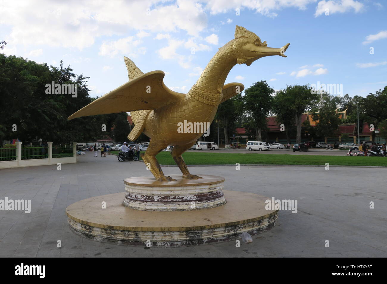 Hang, the sacred golden bird. Statue in a park south of the Royal ...