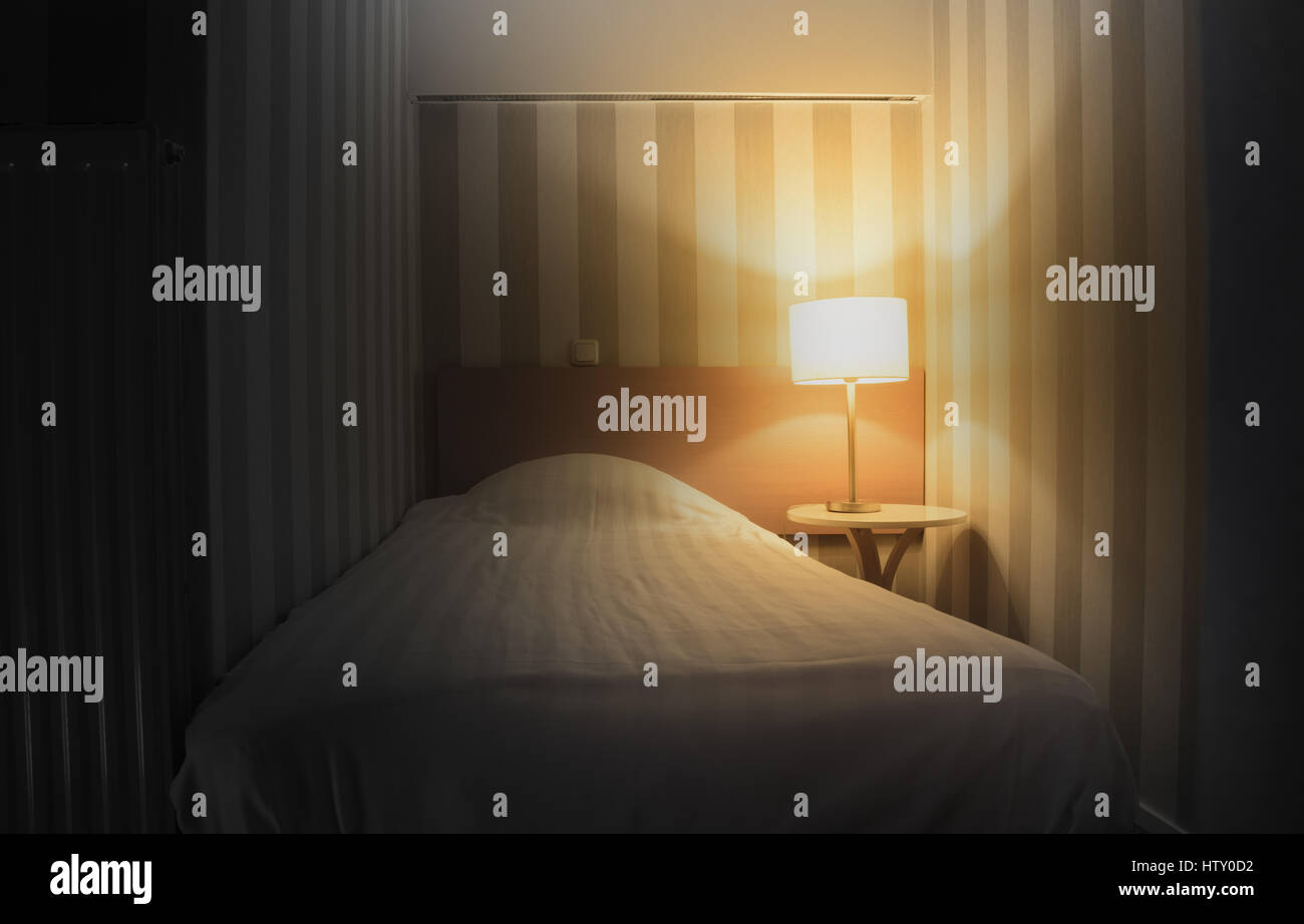 Simple small hotel room (classic), single bed Stock Photo - Alamy