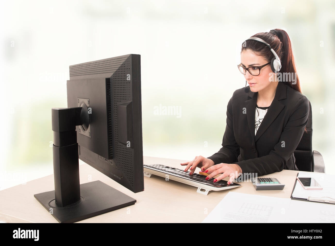 Attractive female support staff hi-res stock photography and images - Alamy