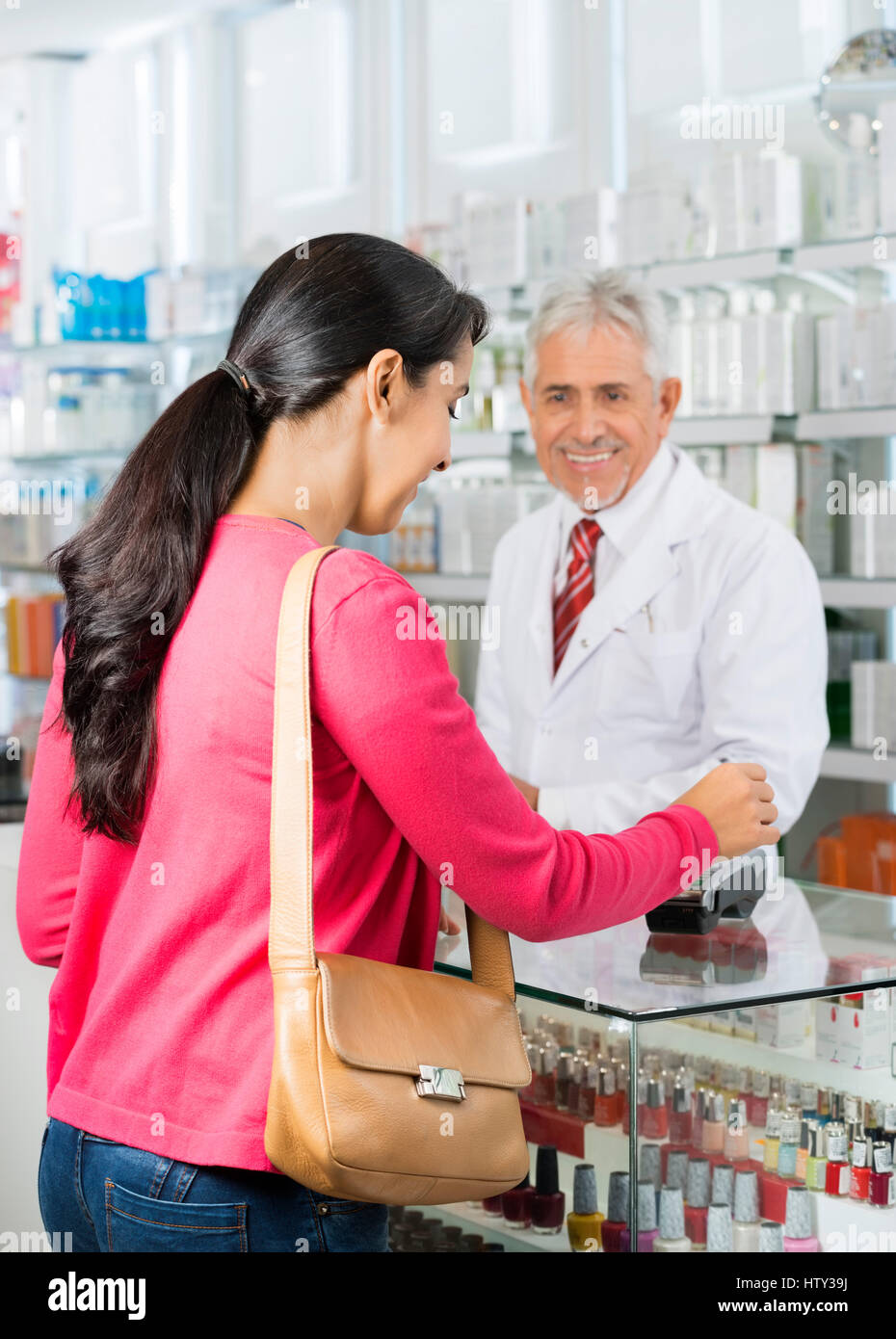 Customer making payment hi-res stock photography and images - Alamy